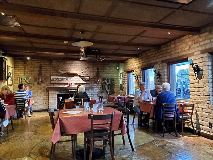 Brick walls and wooden beams frame conversations that matter, in dining rooms where memories are made alongside meals.