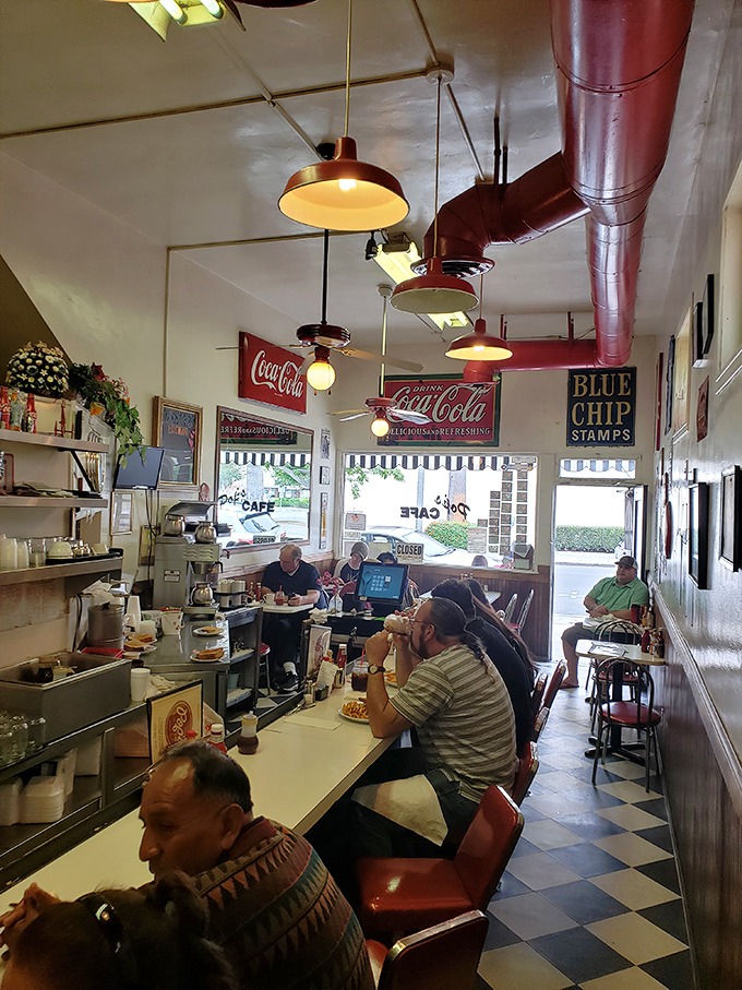 Where strangers become neighbors over coffee refills and hash browns. The real Santa Ana social network has nothing to do with your phone.