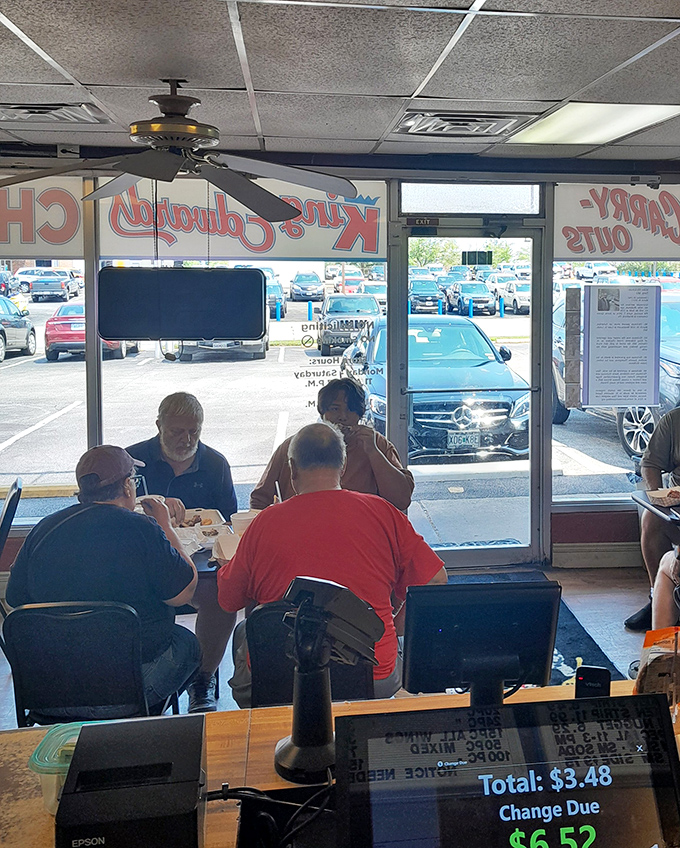 Where strangers become temporary family, united by the universal language of "pass the napkins" and appreciative chicken-induced silence.