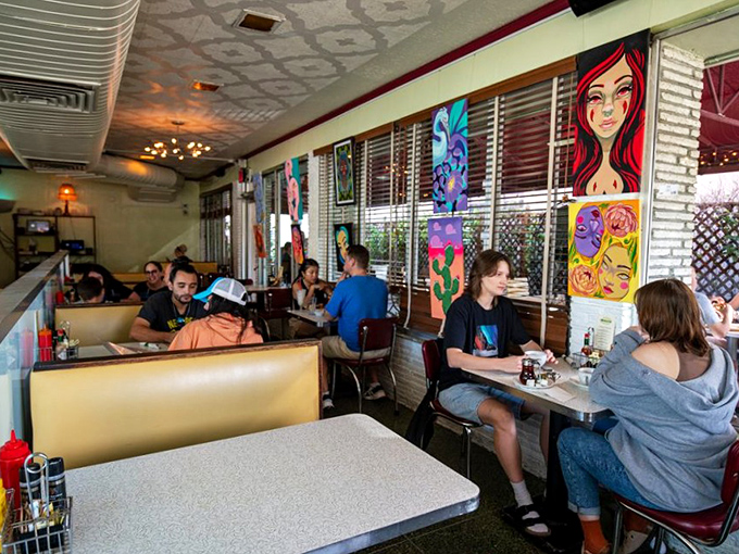 Where locals and visitors share space and stories. The diverse crowd proves great food is the universal language we all speak fluently.