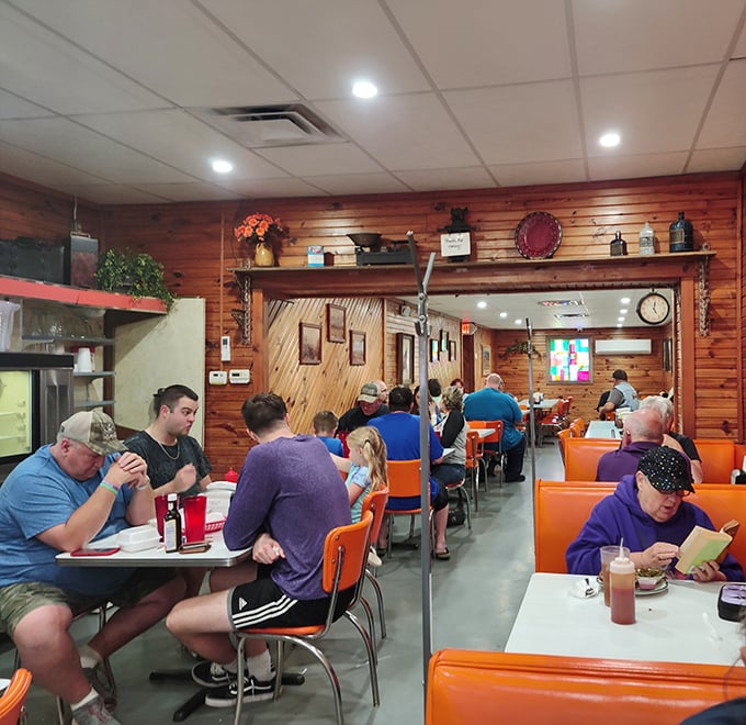 A full house of diners enjoying the simple pleasure of good food and better company—the true definition of community.