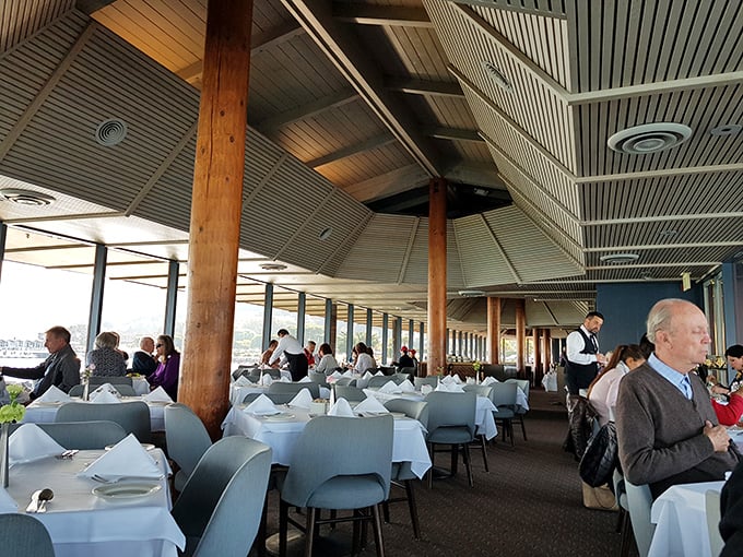 Dining here feels like being on a luxury cruise ship, except the floor doesn't move (unless you've had too many martinis from that well-stocked bar).