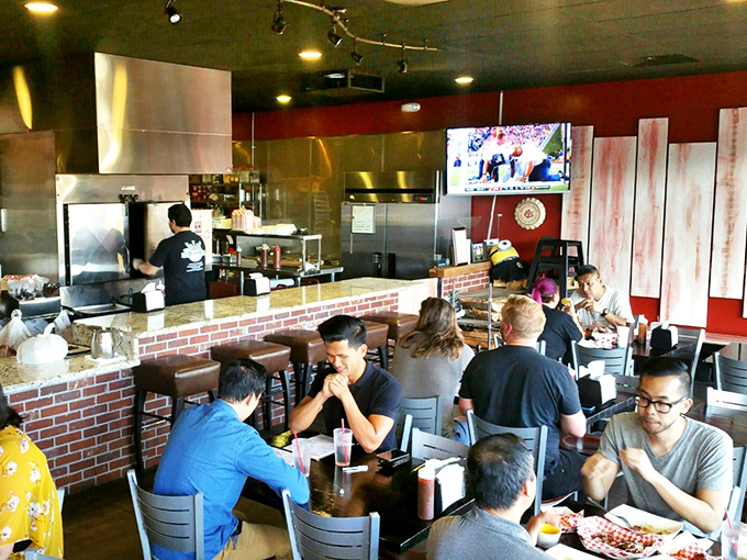 Lunchtime at The Smoking Ribs brings together barbecue pilgrims from all walks of life, united by their quest for smoky perfection.