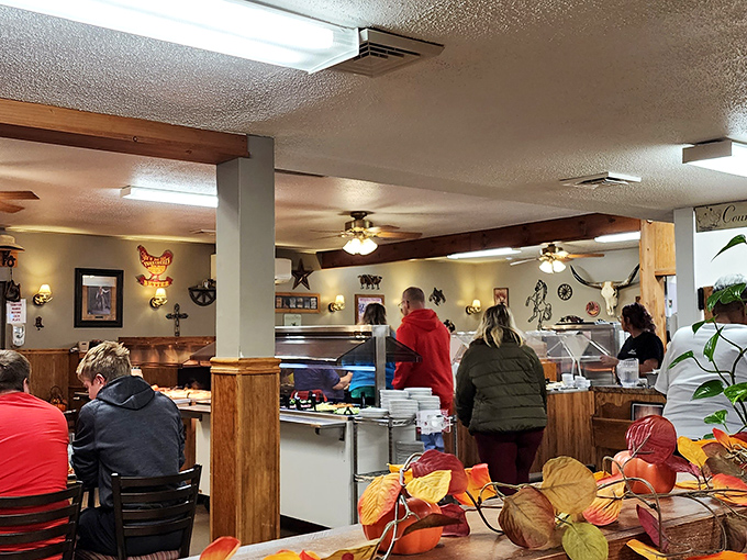 The dining room during the lunch rush – where strangers become temporary family, united by the universal language of "pass the rolls, please."
