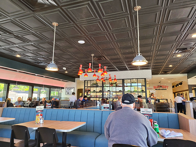 Locals settle into their booths like they're visiting an old friend who happens to make incredible food.