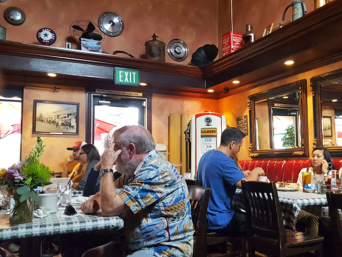 Where breakfast memories are made&mdash;regulars chat while vintage gas station collectibles watch from their perch above the cozy dining room.