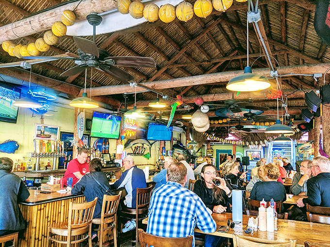 A busy dining room where strangers become friends over shared recommendations and "you gotta try this" moments.