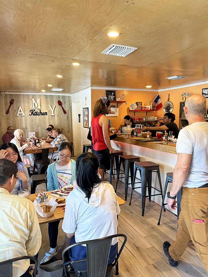 Locals pack the tables at peak hours, the universal language of "mmm" replacing conversation as forks dive into plates of French-inspired comfort.