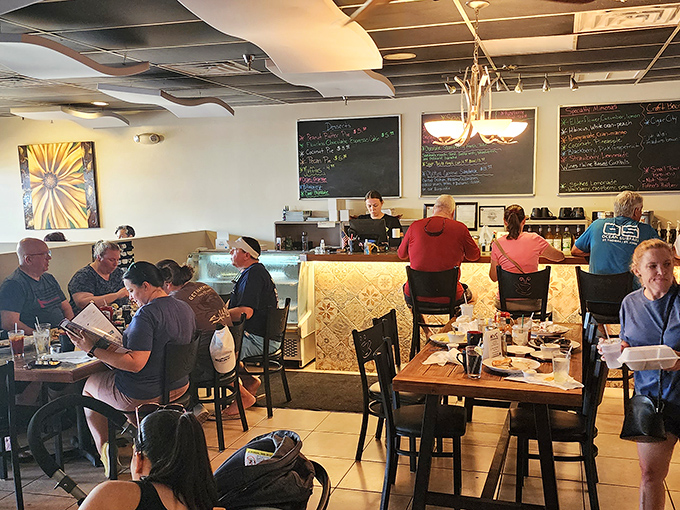 A dining room buzzing with satisfied customers. The best restaurant recommendation is always a full house before 10 AM.