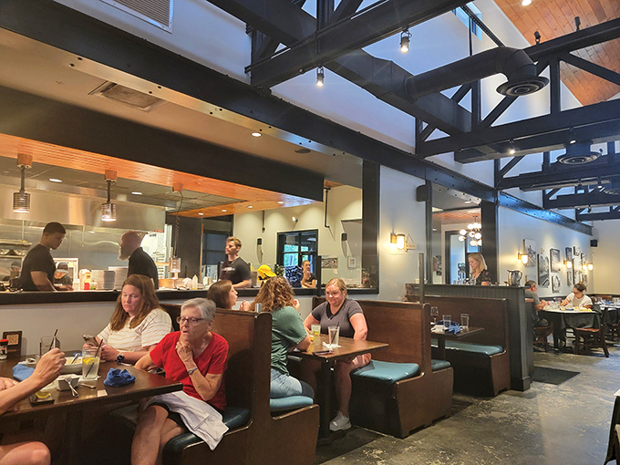 Where conversations flow as smoothly as the drinks. The exposed beams above remind you this place has stories to tell.