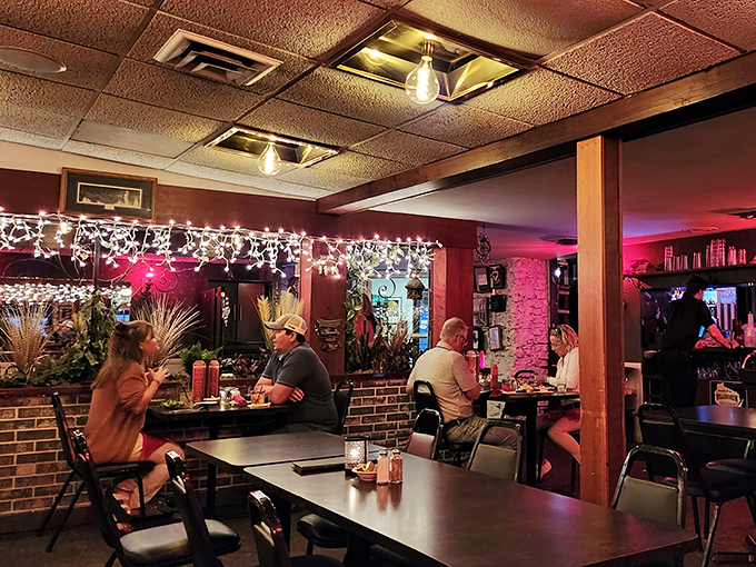 The warm glow of string lights creates that "everyone's welcome" vibe that defines the best Wisconsin dining experiences. Strangers become friends here.
