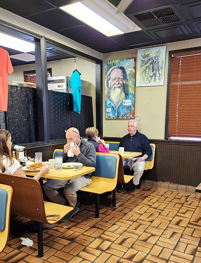 Regulars settle into their favorite spots, newspapers in hand. In an age of digital distraction, there's something revolutionary about breakfast and the morning paper.