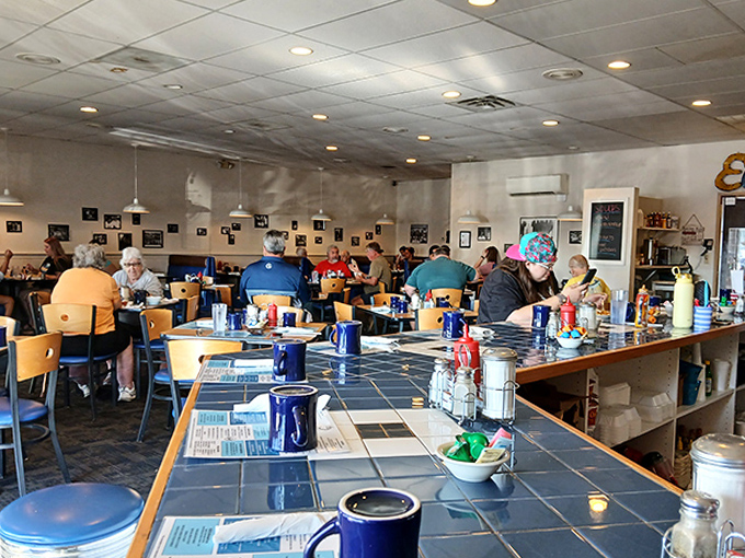 A bustling dining room where strangers become neighbors over plates of comfort food and bottomless coffee refills.