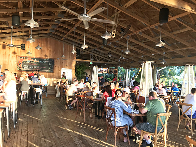 The true Florida dining experience isn't about white tablecloths&mdash;it's about wooden tables, ceiling fans, and the sound of laughter mixing with sea breeze.