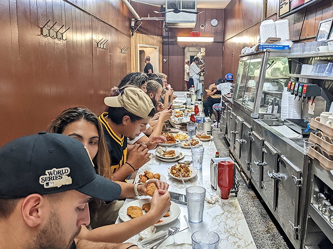 The narrow counter fills with hungry patrons at all hours&mdash;a cross-section of Detroit united by the universal language of good food.