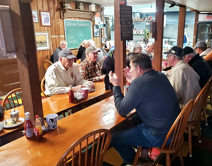 The regulars' table &ndash; where local wisdom is exchanged over eggs and coffee, and where newcomers are sized up with friendly curiosity.
