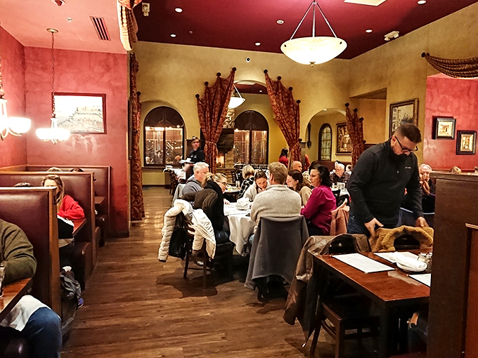 A bustling dining room where memories are made between bites of pasta. Notice how nobody's looking at their phones? That's the power of good food.