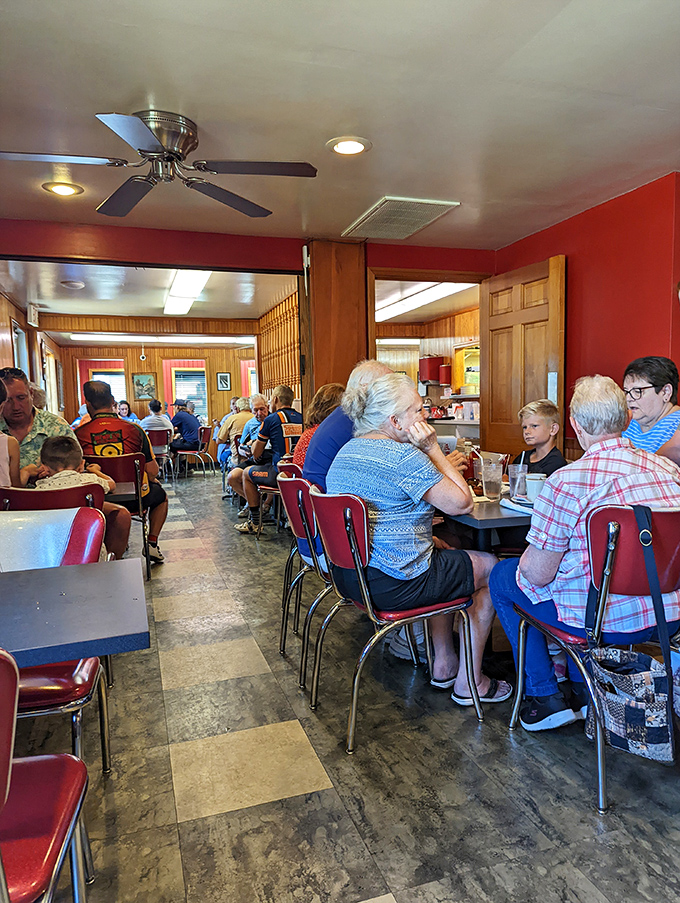 The dining room buzzes with the universal language of good food. Notice how nobody's looking at their phones? That's pie power.