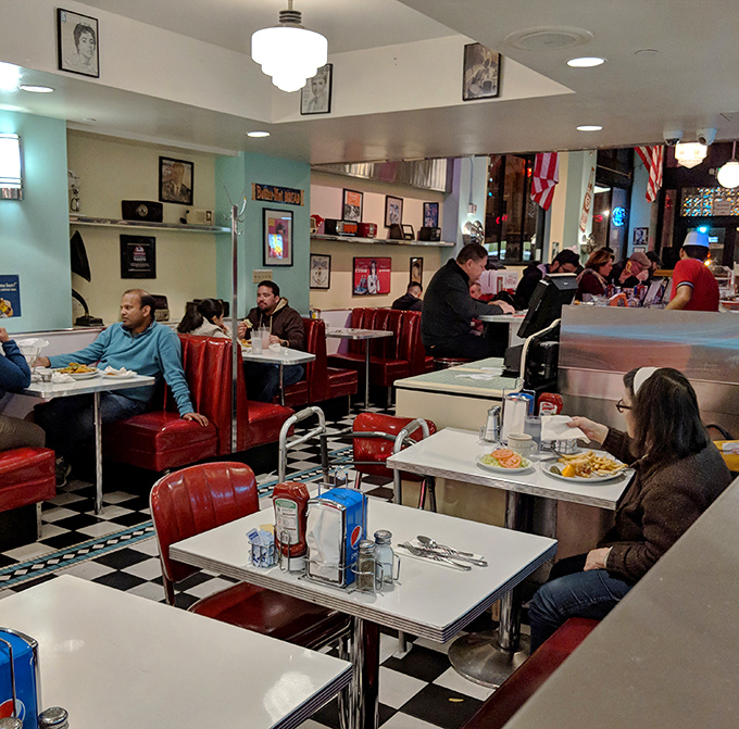Where strangers become temporary neighbors, united by the universal language of "pass the ketchup." Diner culture at its finest.