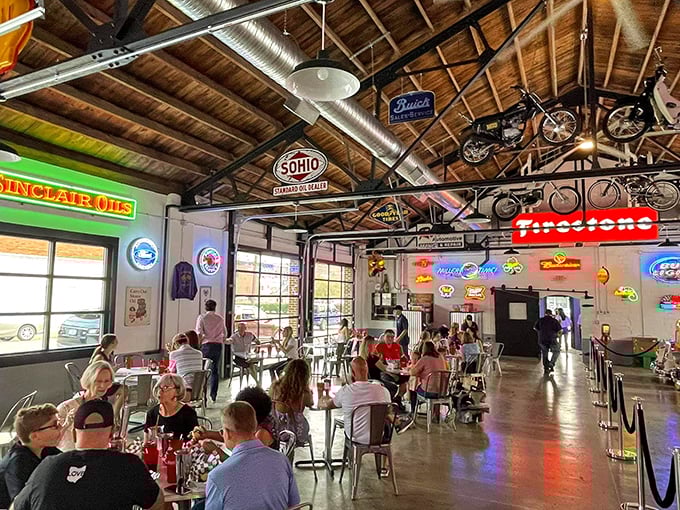 Where strangers become friends over shared tables and mutual appreciation for good food. The neon glow makes everyone look like they're in a classic film.