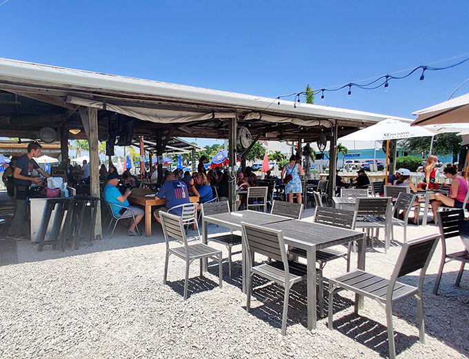 Where locals and tourists find common ground&mdash;under umbrellas, over cold drinks, with the universal language of "pass the hot sauce" bringing everyone together.