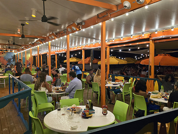 Evening at Frenchy's transforms the patio into a twinkling wonderland where seafood and sunset combine for nature's perfect dinner theater.