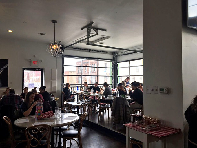 When the garage door opens, the boundary between inside and outside blurs, creating Pittsburgh's most inviting dining room.