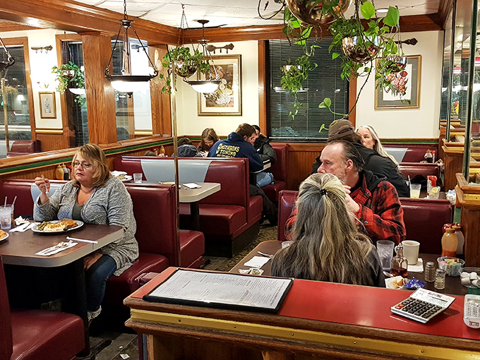 Every booth tells a story. These burgundy seats have cradled first dates, family celebrations, and countless regulars who've made this place their second home.