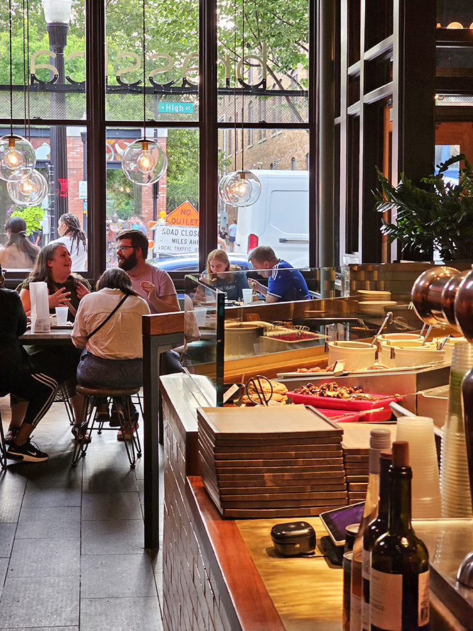 Where conversations flow as freely as the flavors. Those windows frame the Short North like living paintings, making every meal feel like a special occasion.