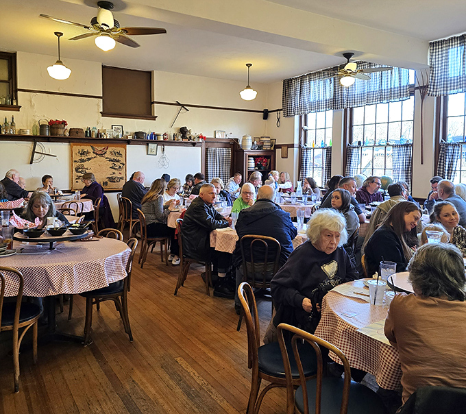 A full house of happy diners proves that this culinary classroom has a perfect attendance record for good reason.