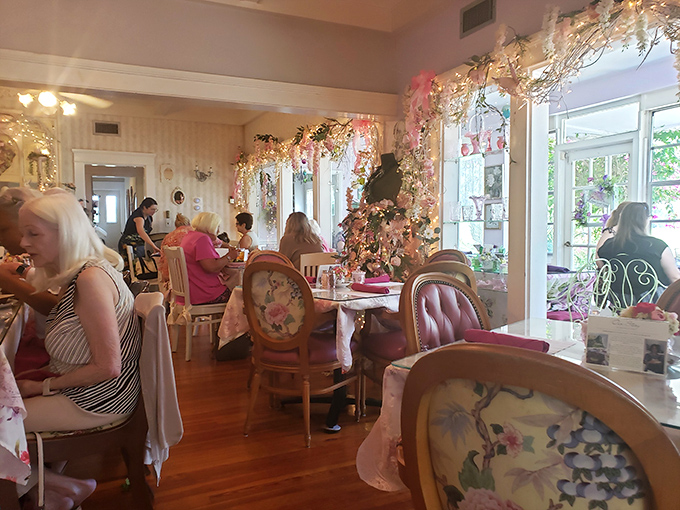 Diners enjoying the delightful cognitive dissonance of eating hearty portions in grandmother's parlor &ndash; and loving every minute.