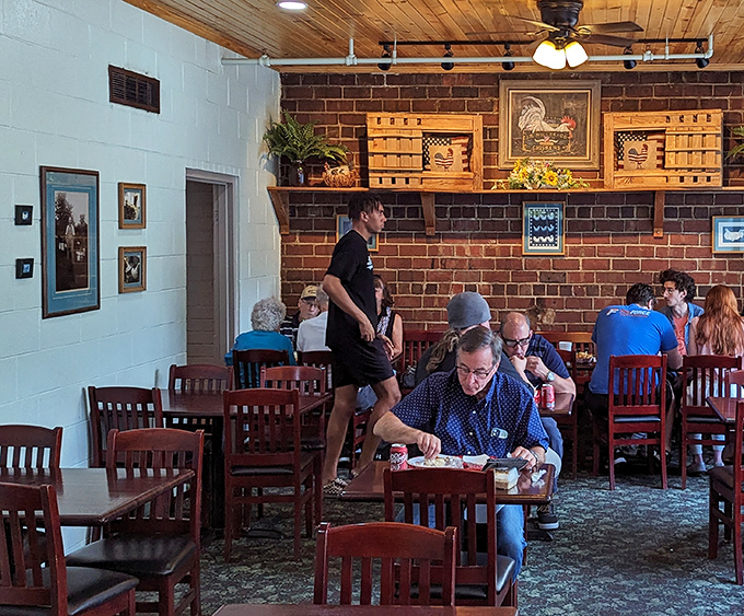 Where locals and visitors alike gather to worship at the altar of perfectly fried chicken—a true community gathering spot.