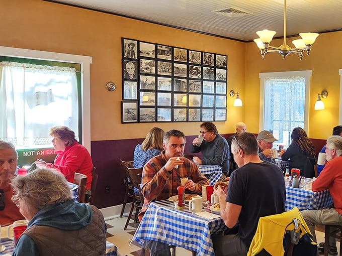 The dining room buzzes with the happy murmur of satisfied customers plotting their desert adventures. Those historic photos on the wall have seen some stories.