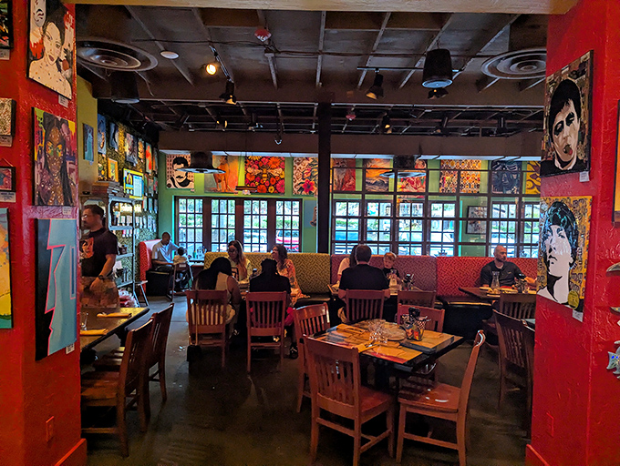 Where art meets appetite. Diners bask in the glow of colorful walls adorned with portraits that watch you enjoy every bite.