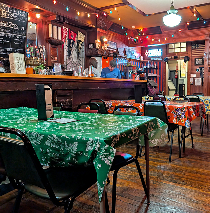 Mismatched tablecloths and simple chairs create the perfect backdrop for culinary magic, proving great food doesn't need marble countertops or designer lighting.