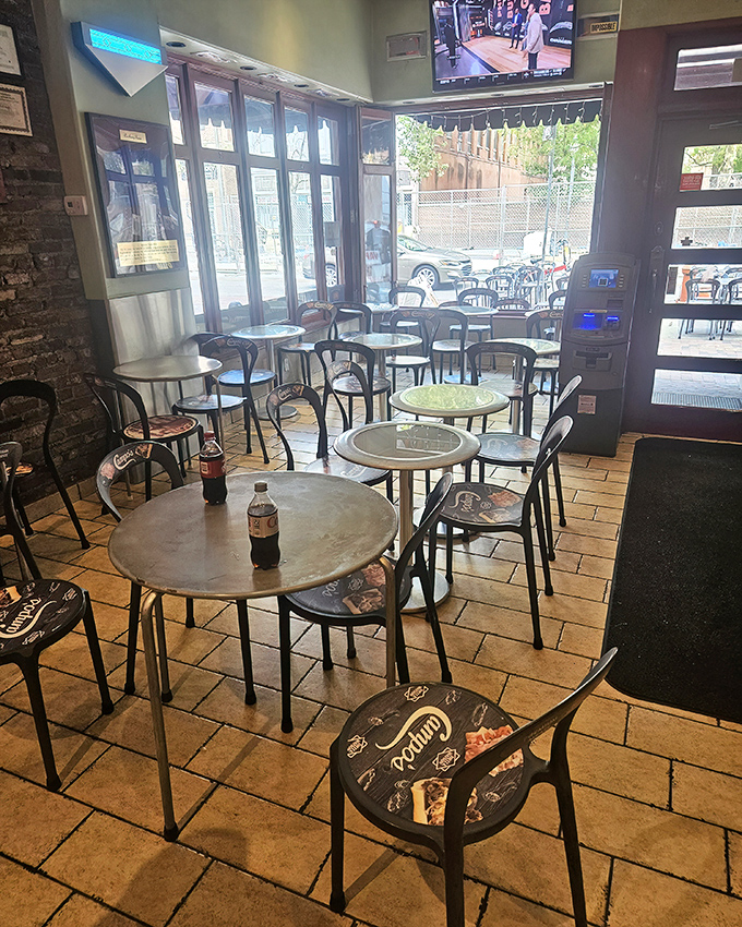 Campo's dining area offers front-row seats to the street theater of Old City, where history and hunger intersect in delicious harmony.