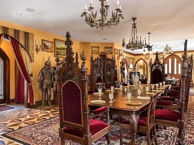 Dinner is served with a side of medieval splendor. Knights in shining armor stand watch as chandeliers cast a golden glow over this regal dining hall.