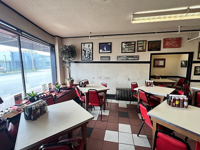 Simple tables, checkered floors, and walls of history. No designer needed when your dining room is already a barbecue cathedral.