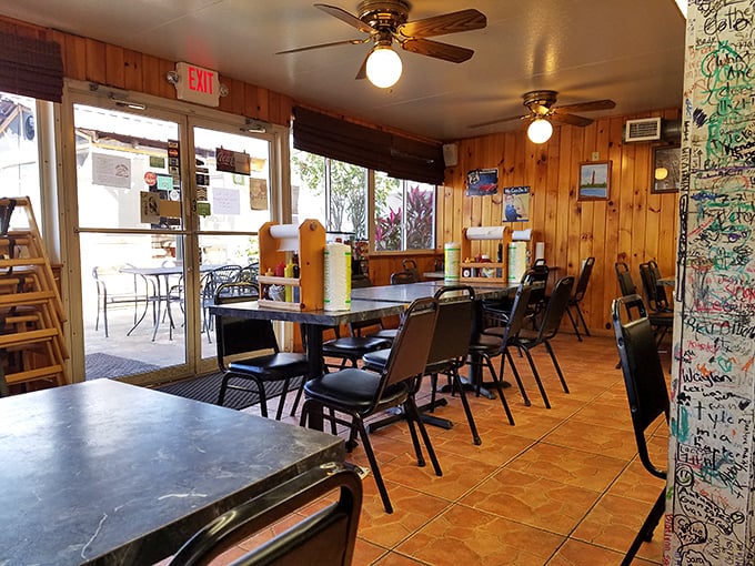 No-nonsense seating for serious eating. Those ceiling fans have witnessed countless "first bite" faces of pure BBQ bliss.