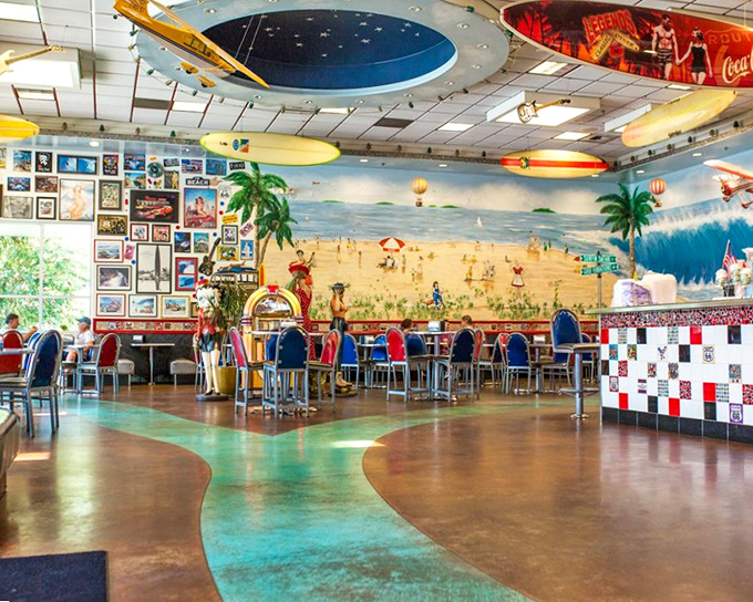 The dining area's beach murals and surfboards create a California twist on classic diner aesthetics—where Route 66 meets Pacific Coast Highway.