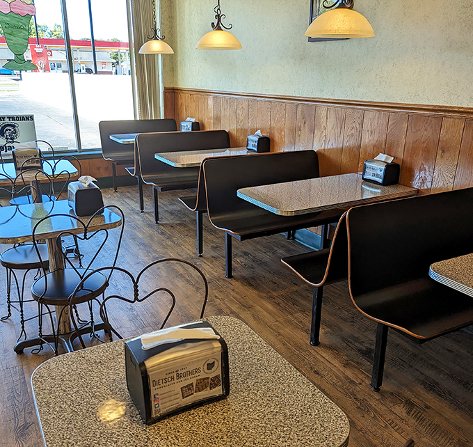 The dining area offers the perfect stage for the main event: watching ice cream melt at precisely the right pace. Simple furnishings let the flavors take center stage. 