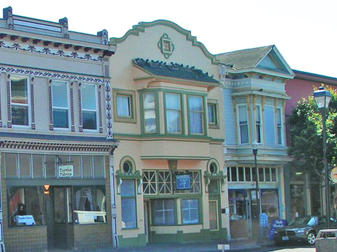 Colorful Victorian storefronts bring whimsy to everyday errands &ndash; banking feels less painful when your financial institution resembles a dollhouse.