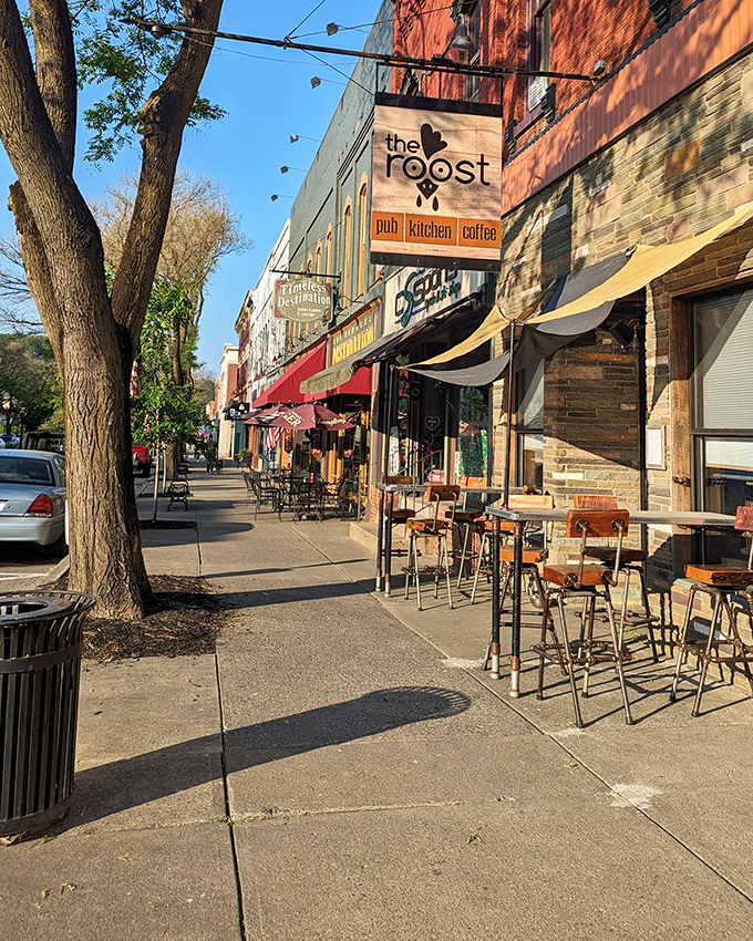 Sidewalk dining at The Roost invites passersby to pause and savor life at a slower pace, where coffee and conversation flow freely.