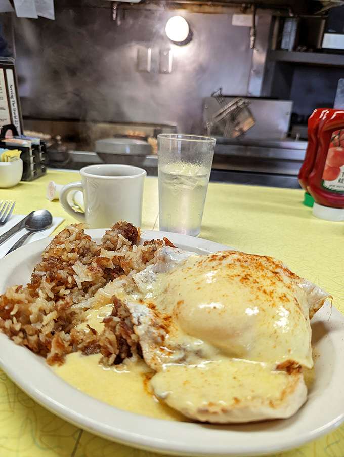 Eggs Benedict with a hollandaise sauce so rich it probably has its own offshore bank account. Worth every delicious calorie.