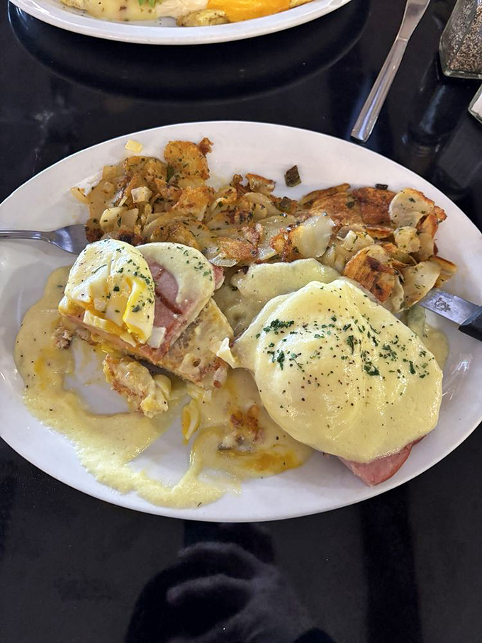 Eggs Benedict that would make a brunch enthusiast weep tears of hollandaise joy. Those seasoned potatoes are no mere sidekick.