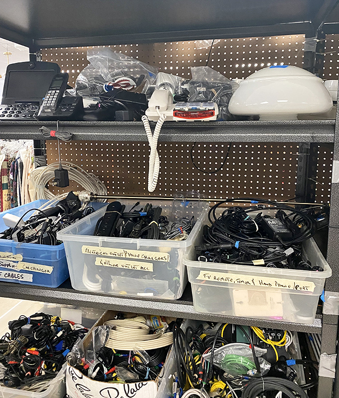The cable bin: technological archaeology where forgotten chargers and mysterious adapters wait for their long-lost devices to return. 