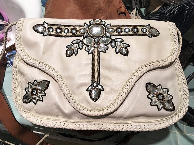 This vintage clutch has probably held more prop money than real cash &ndash; but the style is priceless.