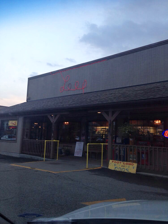 As dusk settles, the neon "Lee's" sign becomes a beacon for hungry travelers. Like a lighthouse guiding ships to safe harbor&mdash;if ships craved comfort food.