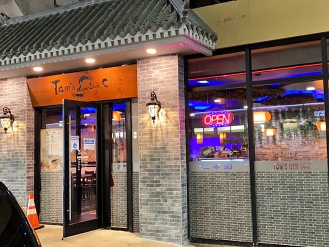 The neon "OPEN" sign might as well say "PARADISE FOUND." This entrance has welcomed countless hungry souls into dumpling nirvana.