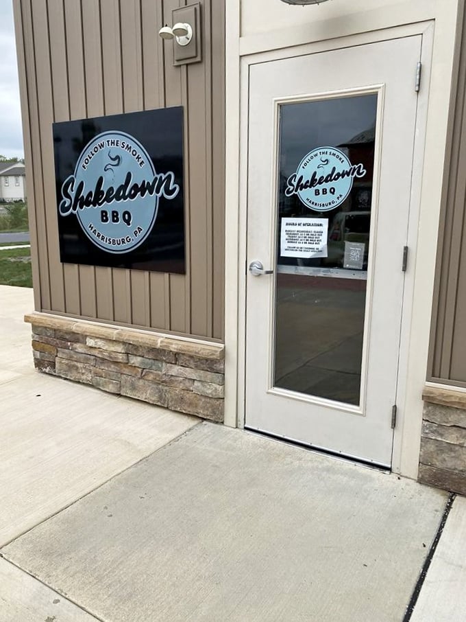 Clean lines and welcoming signage promise exceptional barbecue experiences waiting just beyond that inviting glass door.